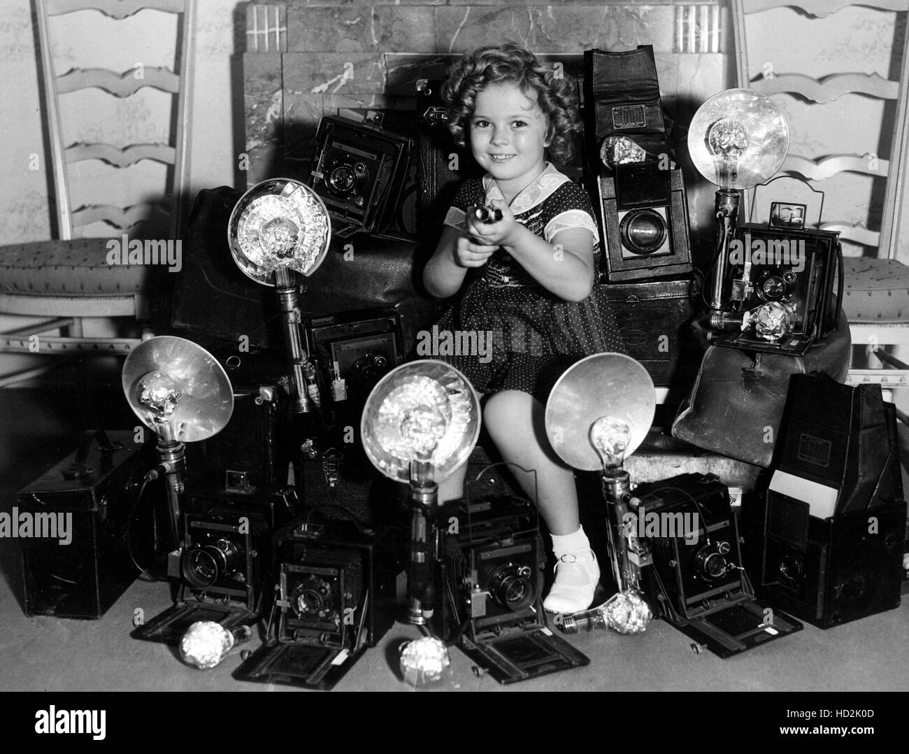 Shirley Temple standing guard over the Hollywood Press Photographers ...