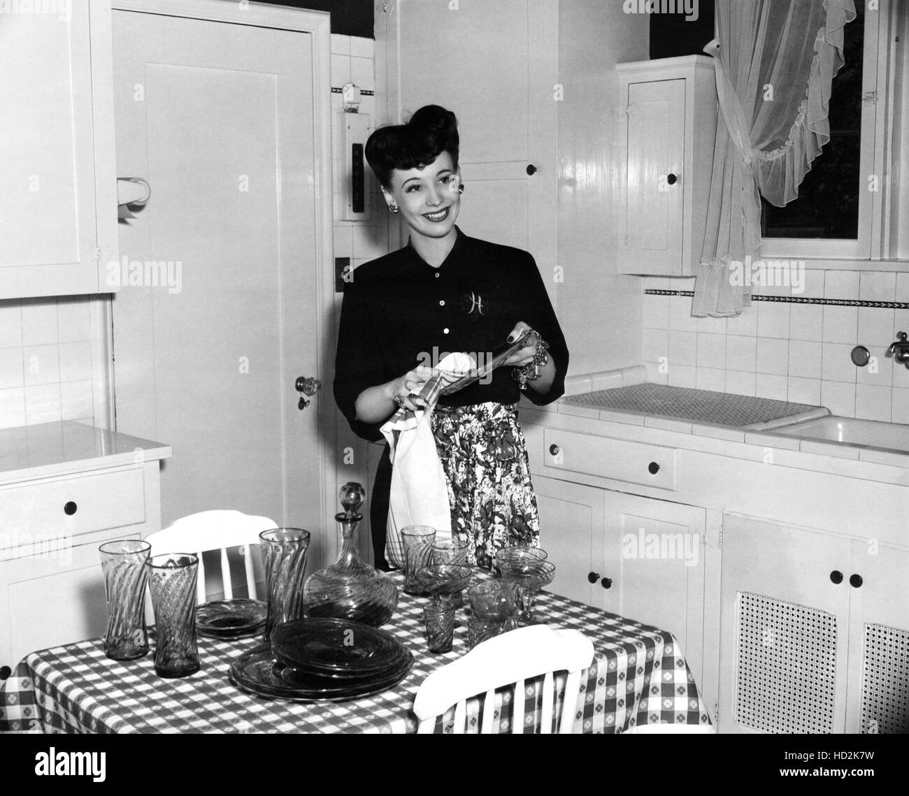 Signe Hasso, doing the dishes in her Hollywood home, 1945 Stock Photo ...