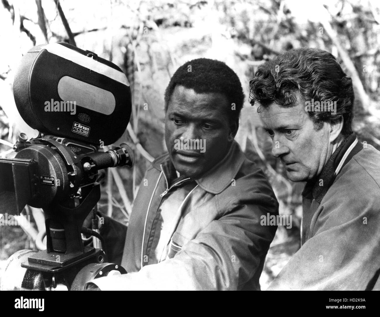 SIDNEY POITIER, directing film A Warm December, with cinematographer ...