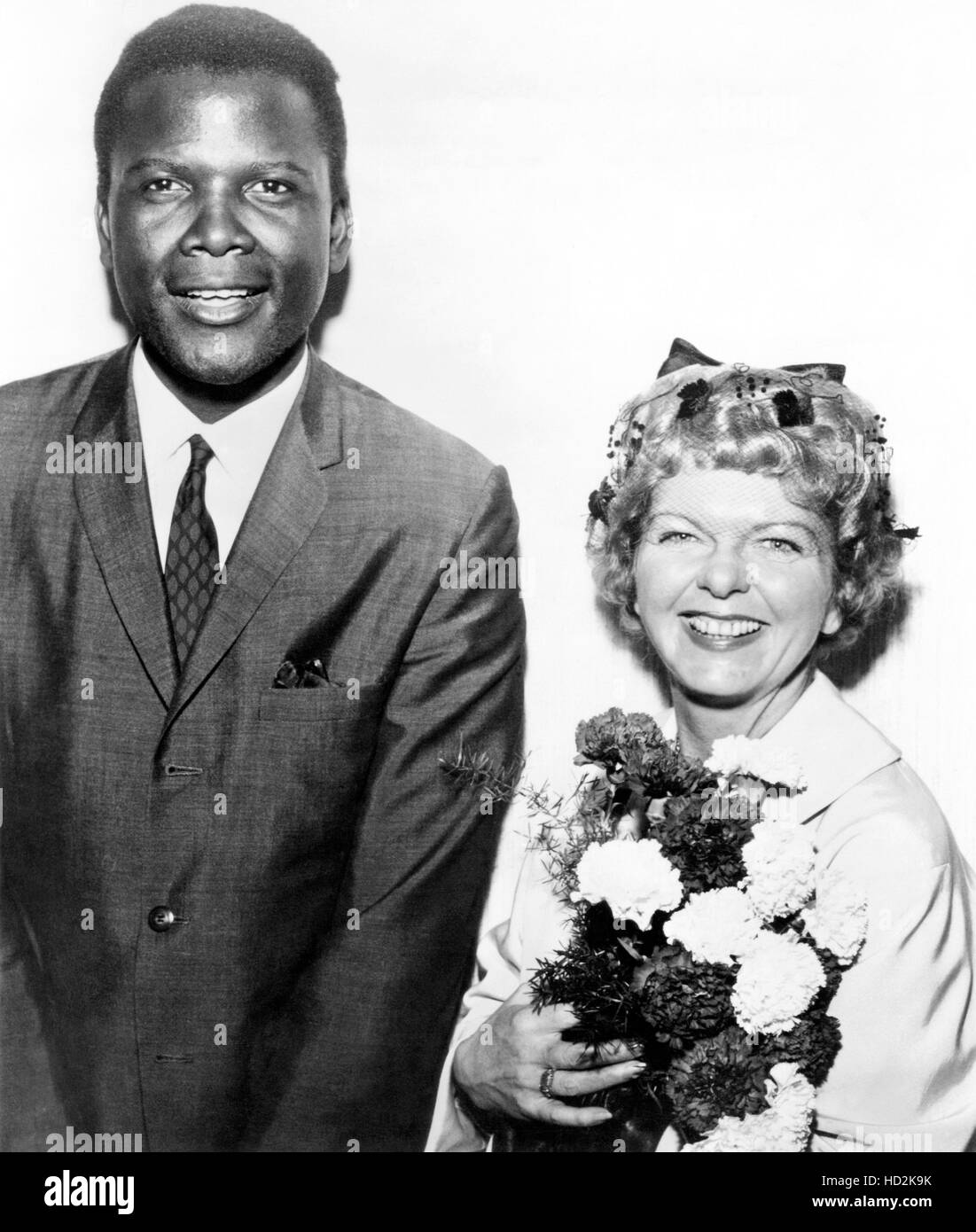 From left: Sidney Poiter with co-star Lisa Mann, receiving news of his ...