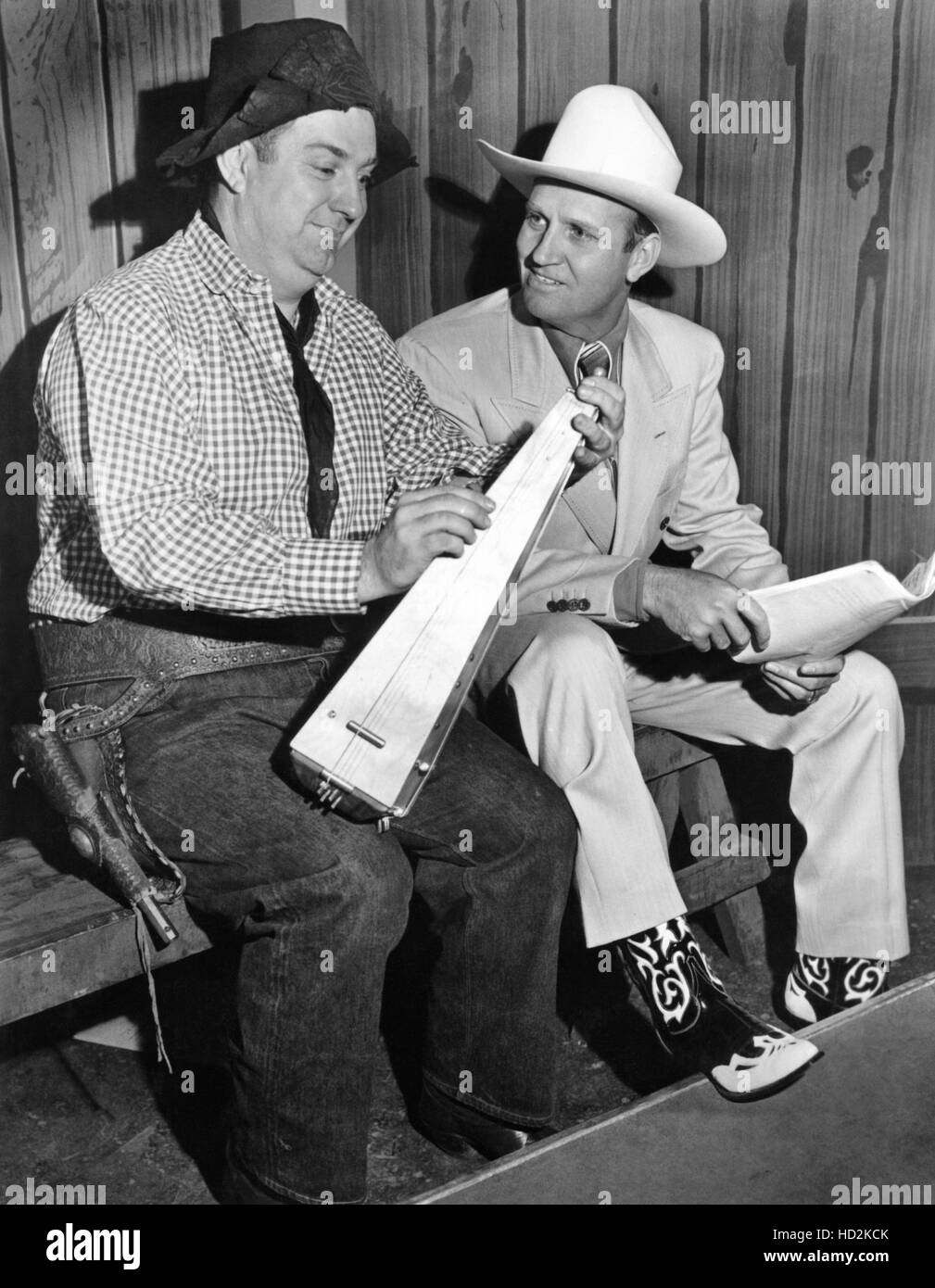 From left: Smiley Burnett, Gene Autry between scenes, on set, ca. 1940s ...