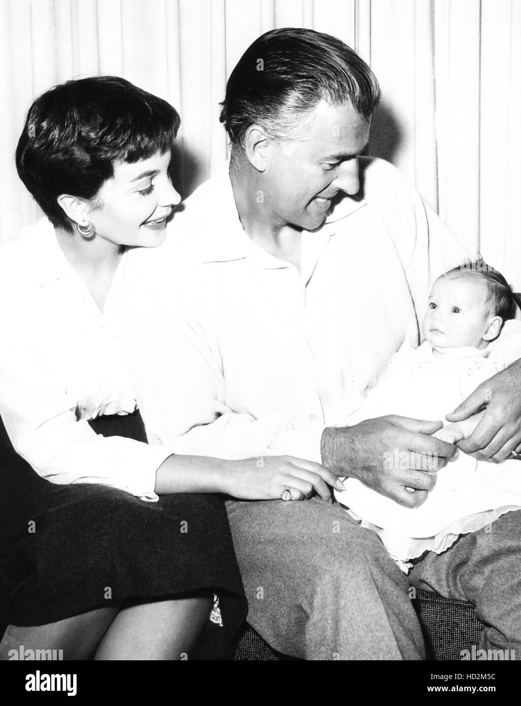 From left: Jean Simmons, Stewart Granger with their two month old ...