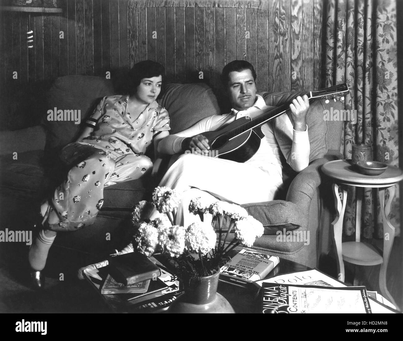 Winifred Bryson, Warner Baxter, at home, ca. early 1930s Stock Photo ...