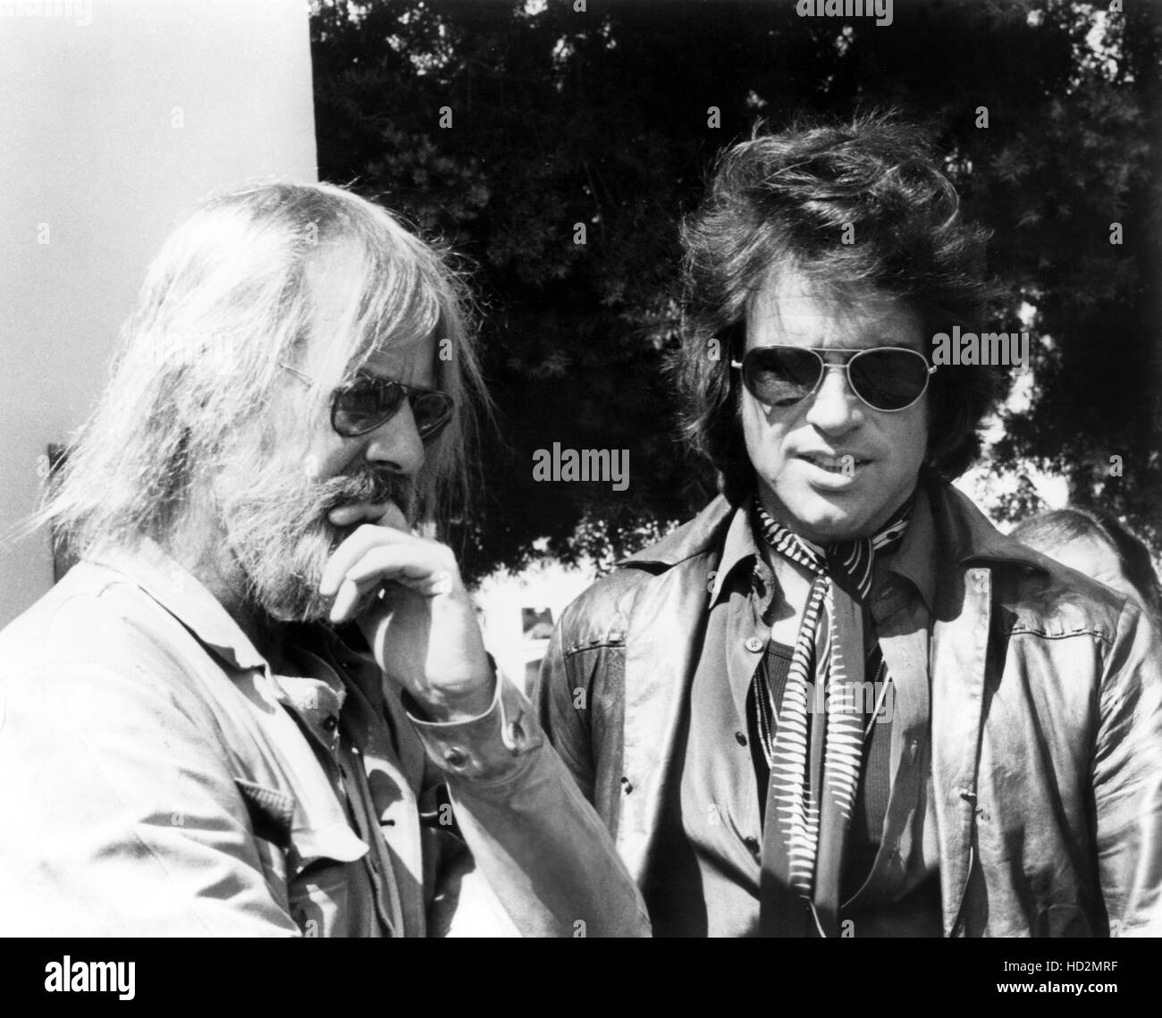 Director Hal Ashby, Warren Beatty, on the set of SHAMPOO, 1975 Stock ...