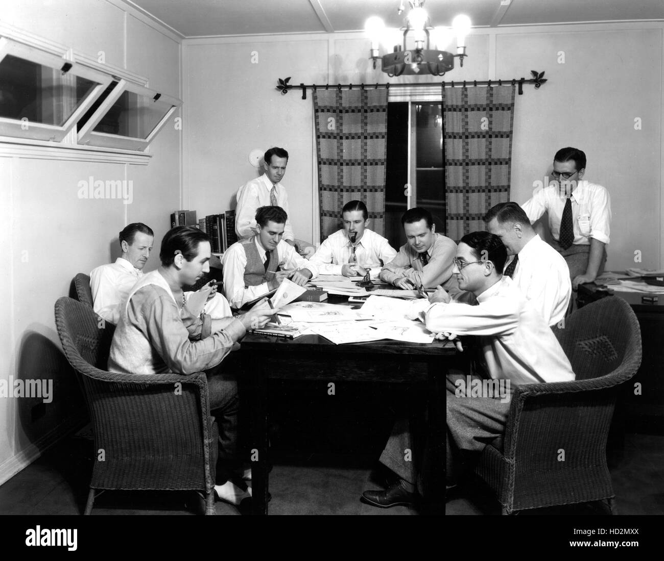 WALT DISNEY, with staff in a story conference, 1933 Stock Photo - Alamy