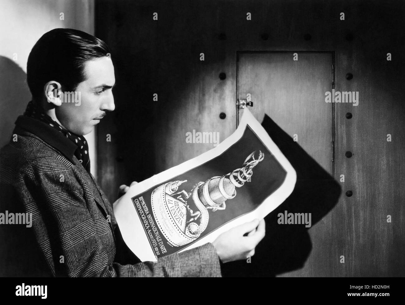 Walt Disney with award from the Venice Film Festival, 1935 Stock Photo ...