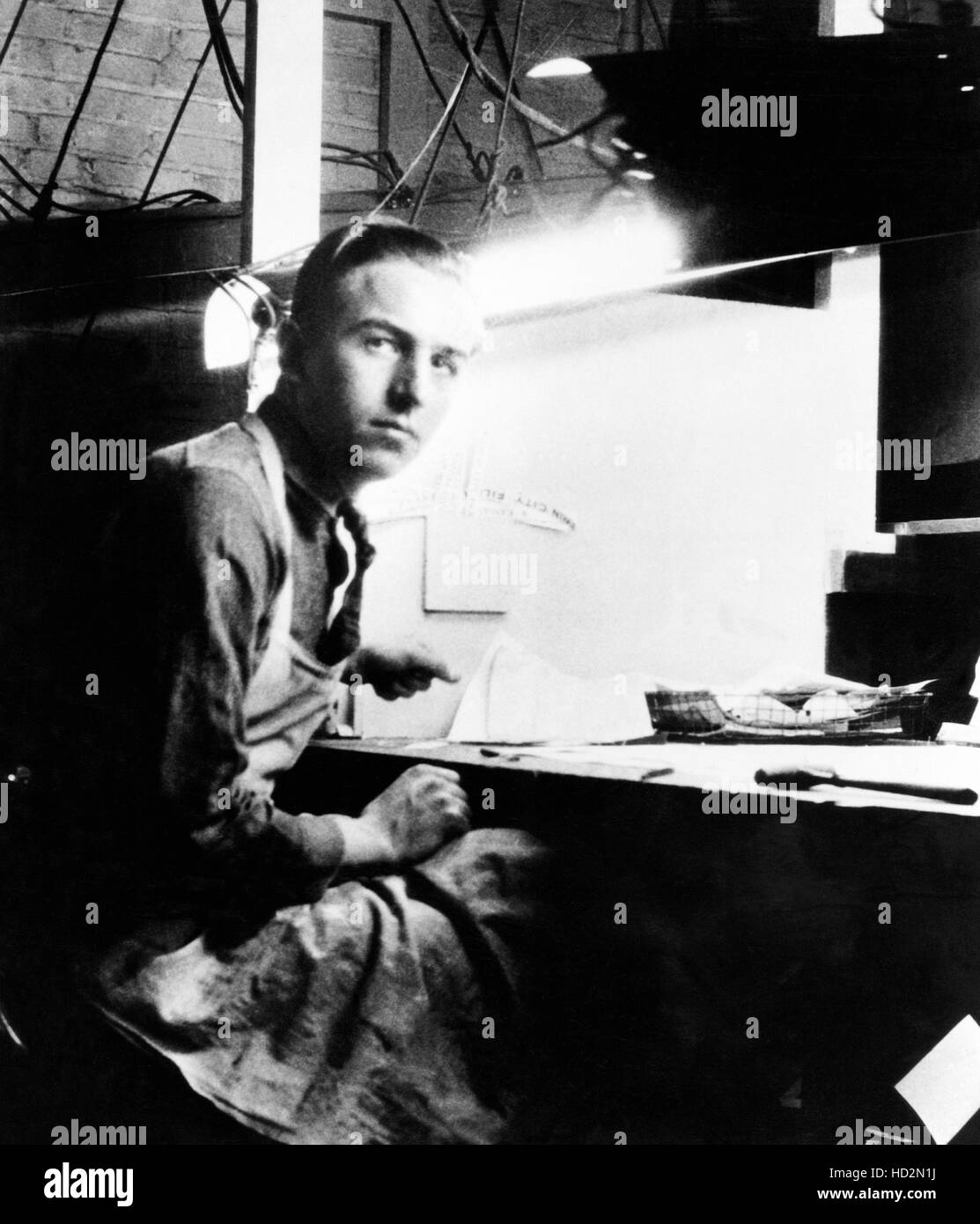 Walt Disney at work at his first free lance job of designing ...