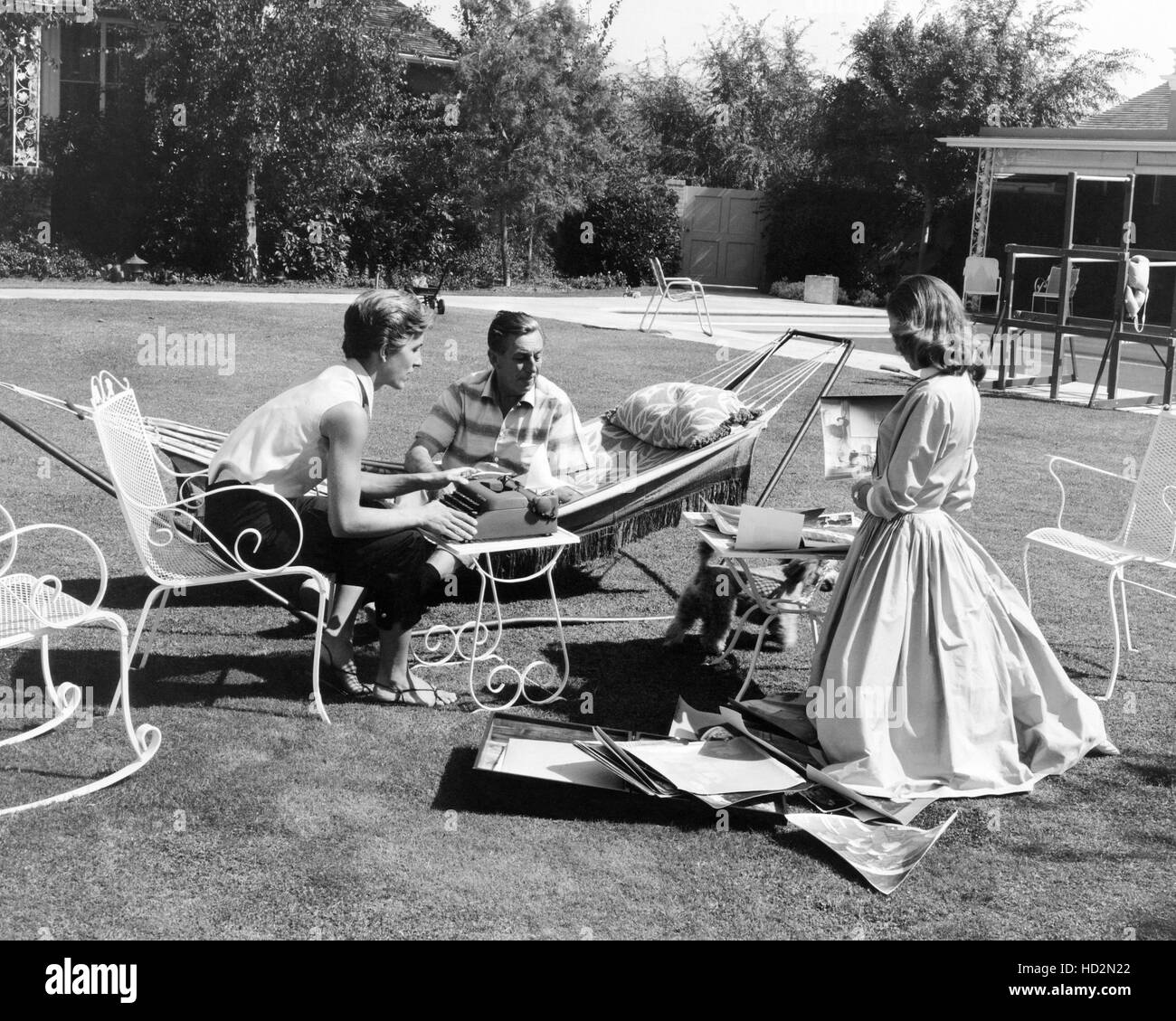 Walt Disney (center) at home with his daughters Diane Disney (left) and ...