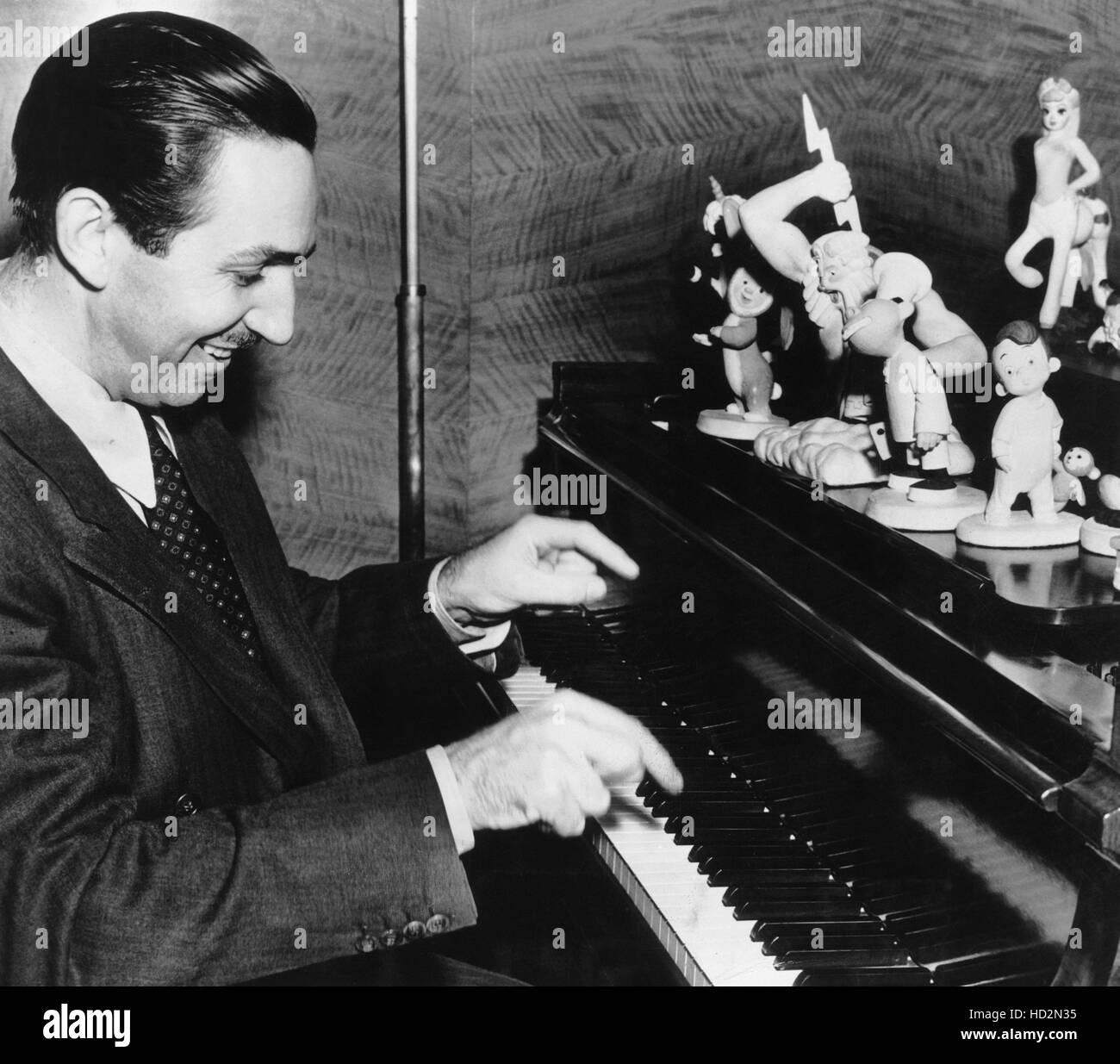 Walt Disney, with models for some of his FANTASIA characters, 1940 ...