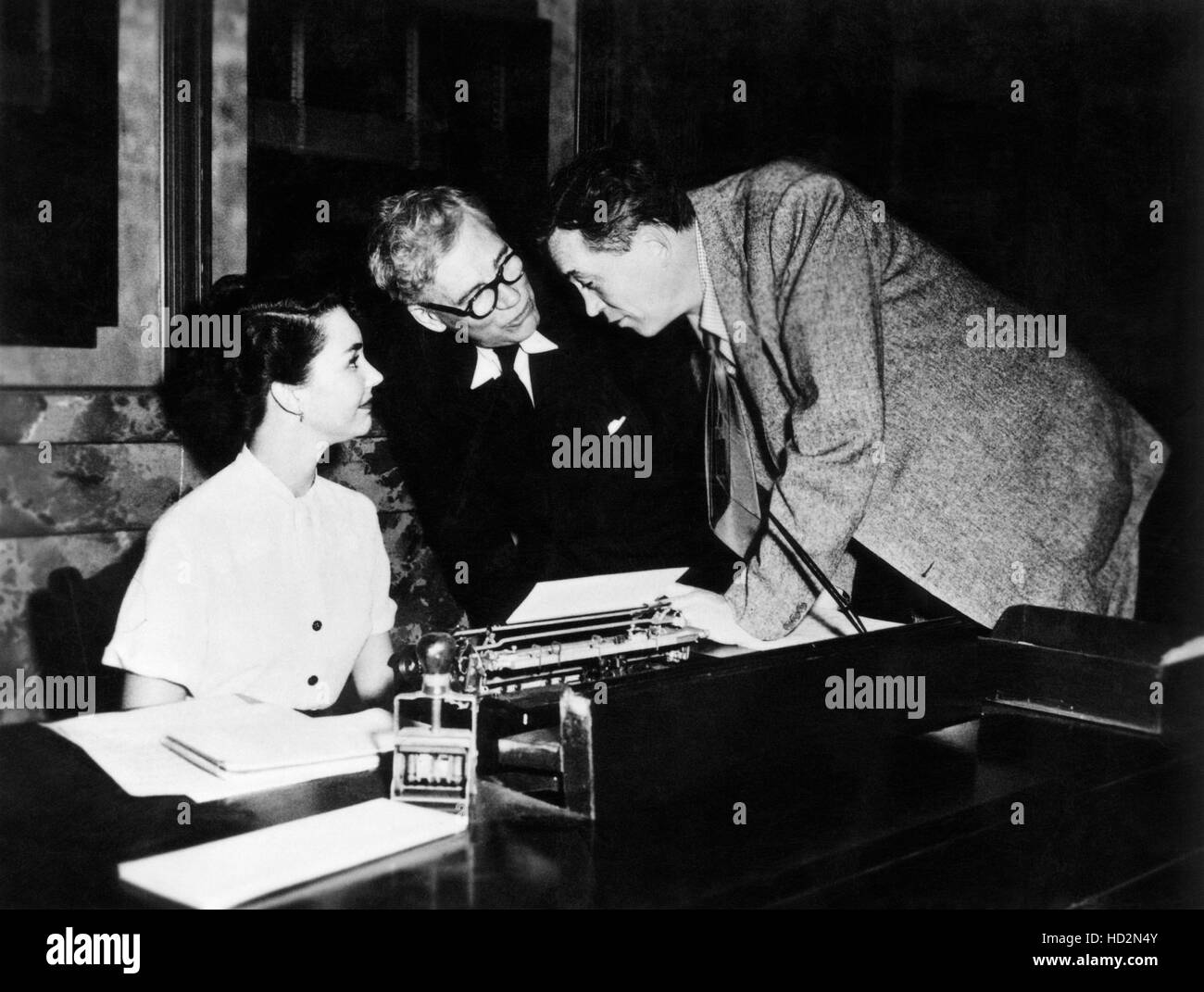 Walter Huston (center) visits son John Huston (right) and Jennifer ...