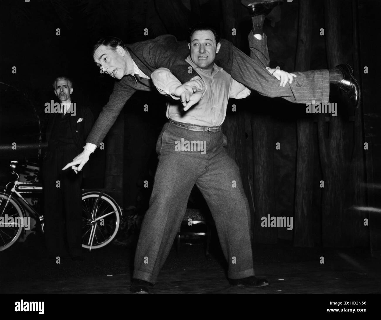 Walter Huston being tossed around by wrestler Allen Reed, 1940 Stock ...