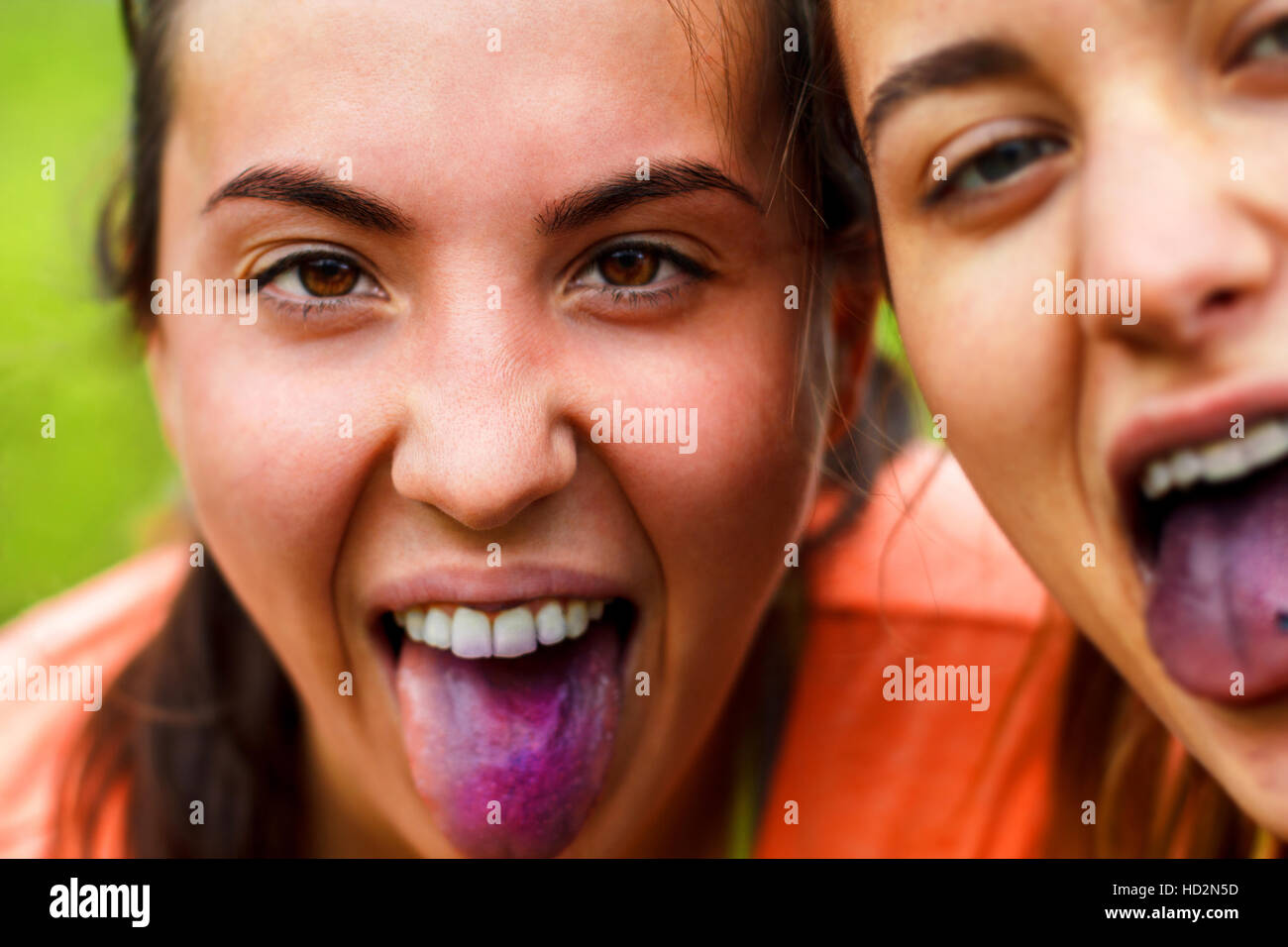 Friends sticking out tongues hi-res stock photography and images - Alamy