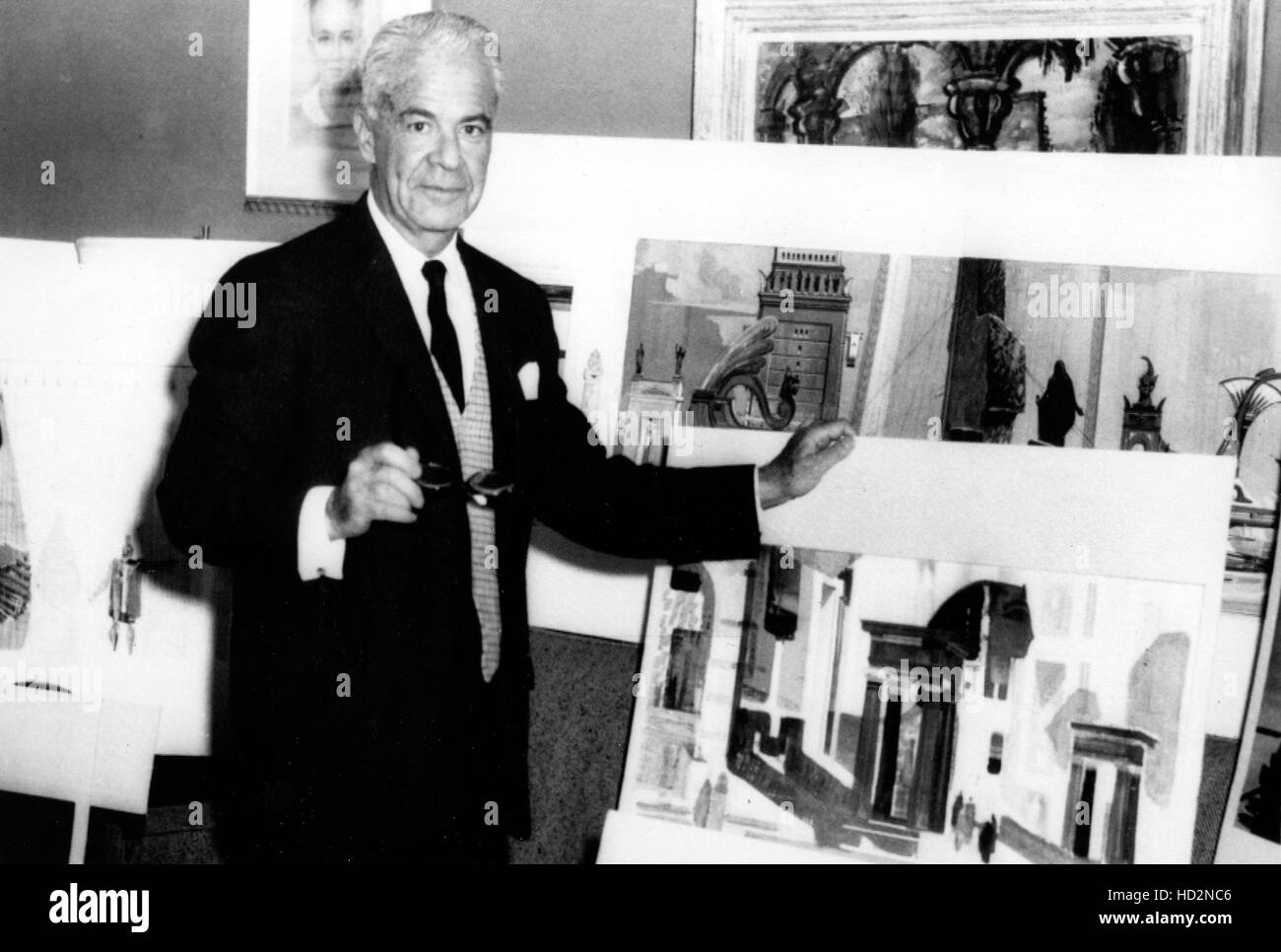 WALTER WANGER shows off sketches for upcoming film "Cleopatra", 04/01 ...