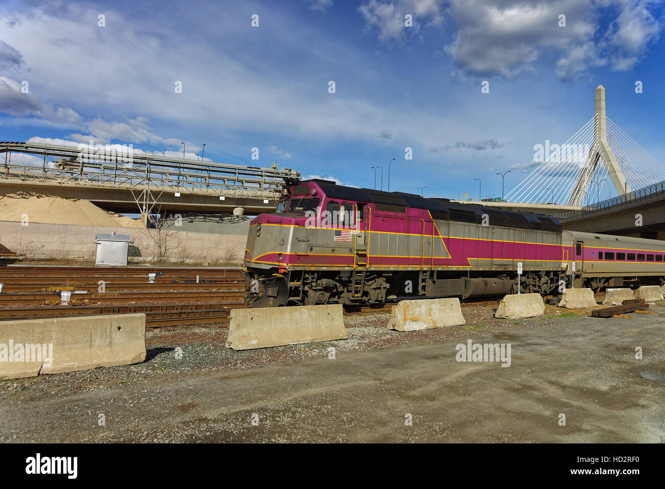 Railway Train and Leonard Zakim Bunker Hill Memorial Bridge in Boston ...