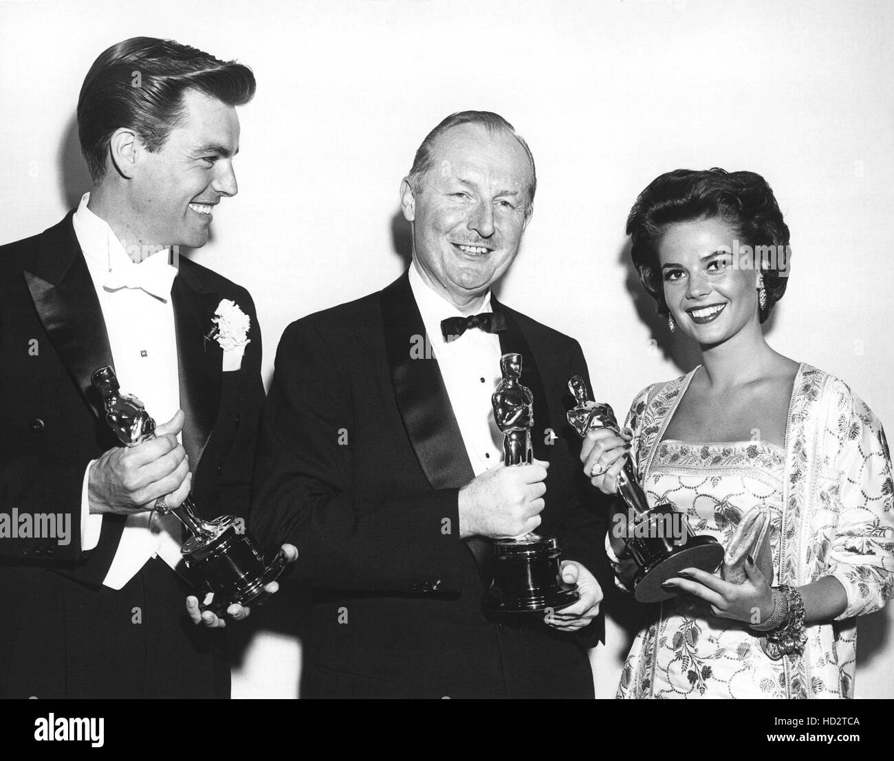 Robert Wagner, James Algar, Natalie Wood holding Oscars, 1950s Stock ...