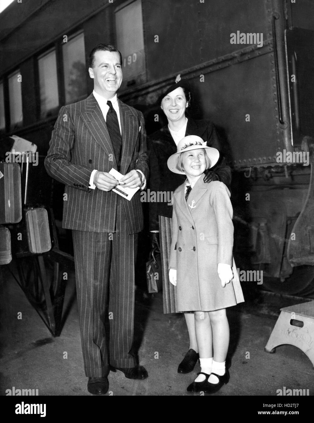 From left: Neil Hamilton, wife Elsa Hamilton, adopted daughter Patricia ...