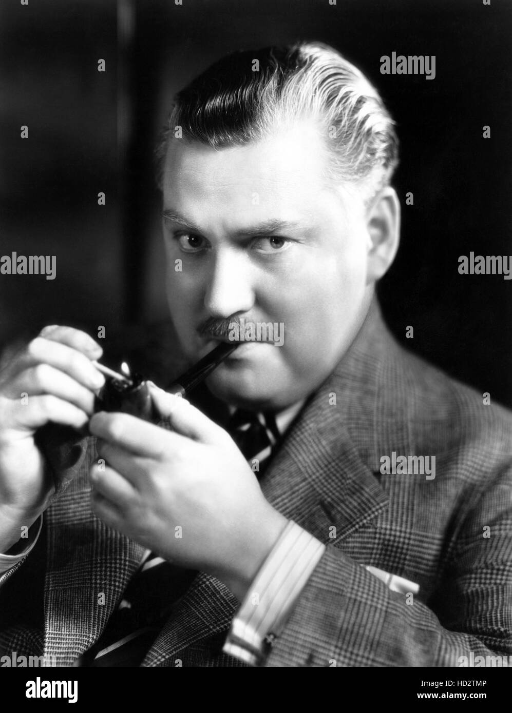 Nigel Bruce, ca. 1930s, photo by Max Munn Autrey Stock Photo - Alamy