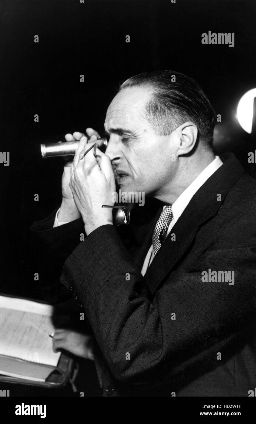 RENE CLAIR during production of LES BELLES DE NUIT, (aka BEAUTIES OF ...