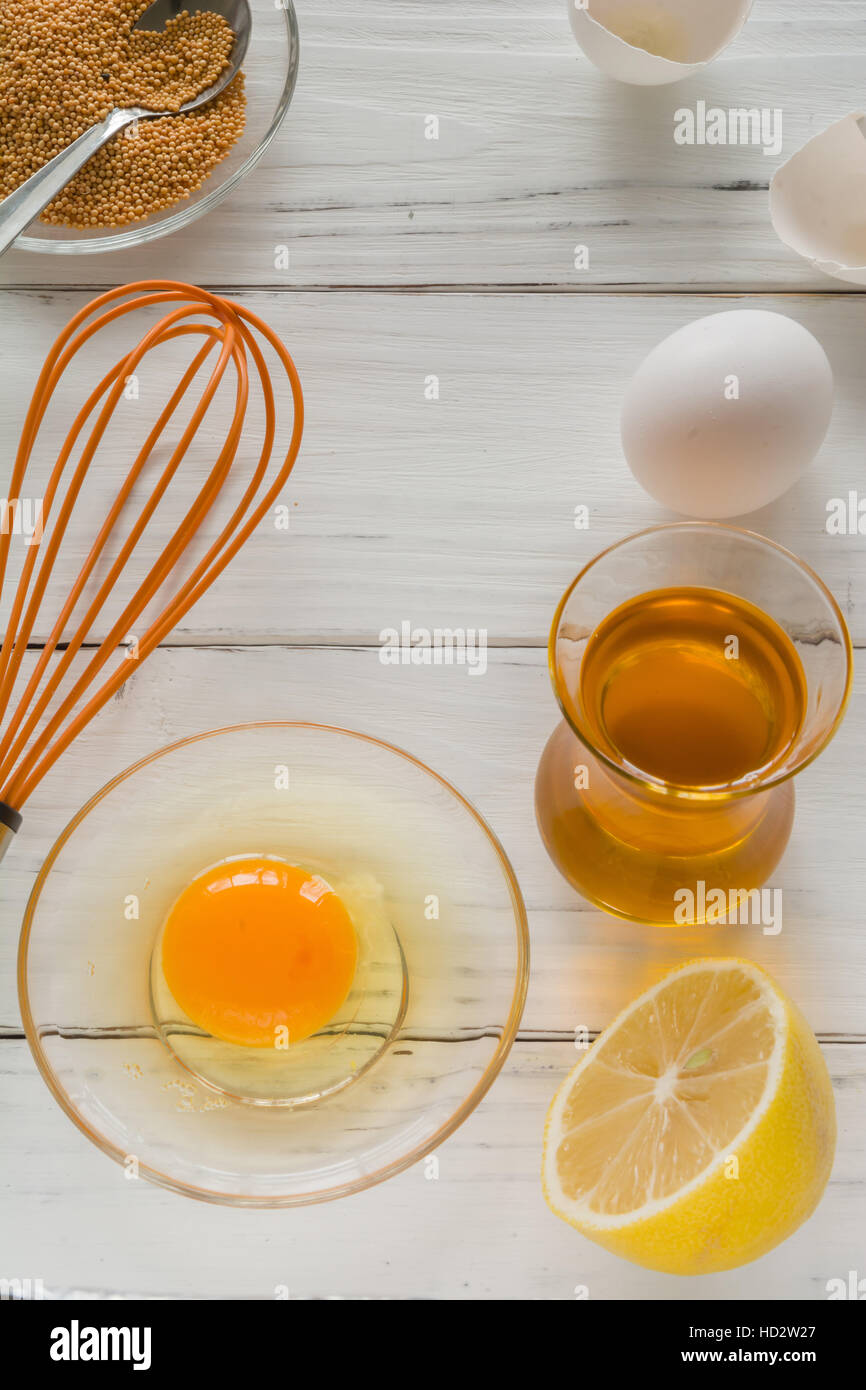 ingredients for cooking. Broken egg shells and oil Stock Photo - Alamy