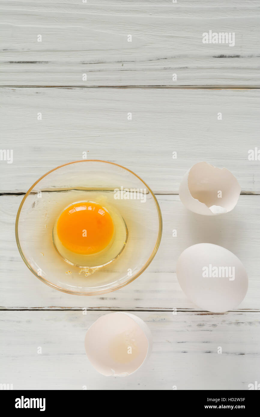 ingredients for cooking. Broken egg shells and oil Stock Photo - Alamy