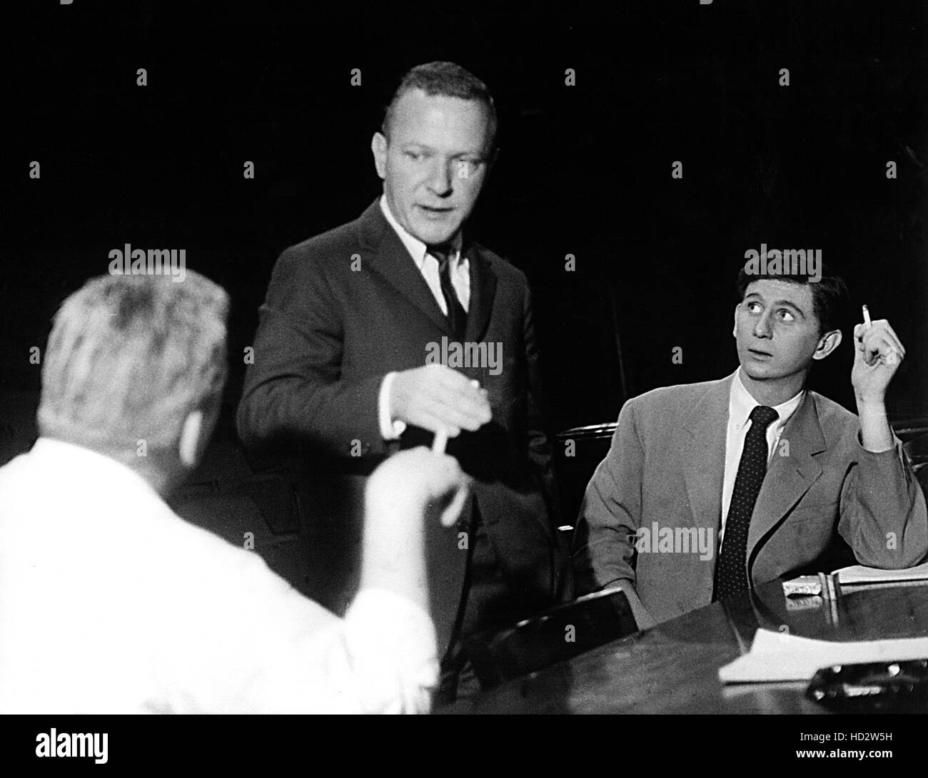 Author, REGINALD ROSE, on stage with cast members, HARRY BERGMAN (L ...