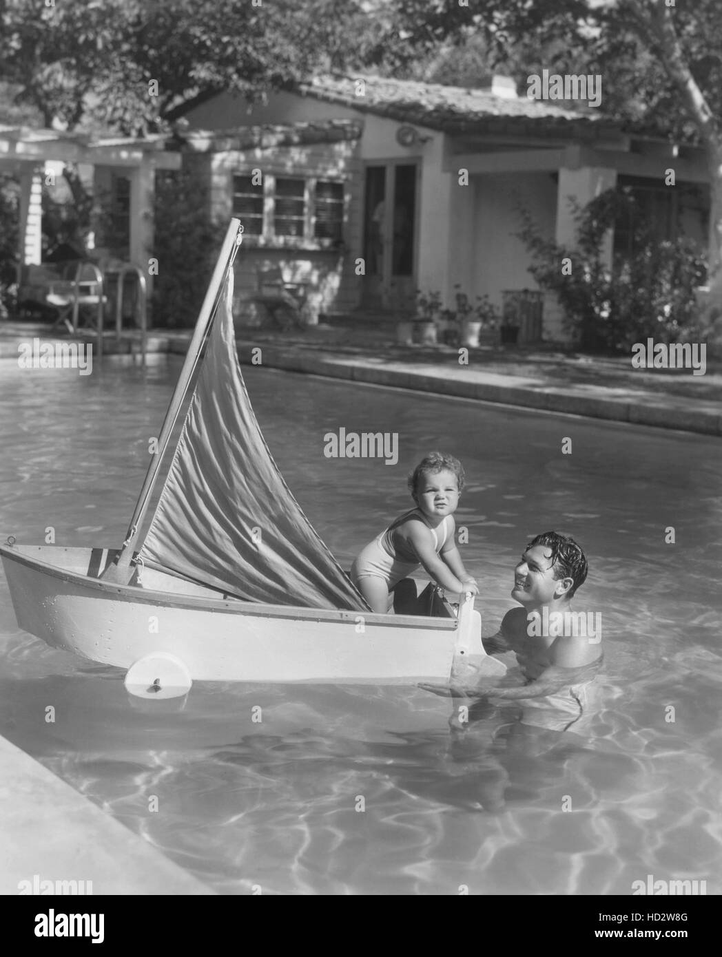 Richard Arlen (right) and son Richard Arlen Jr. at home with a ...