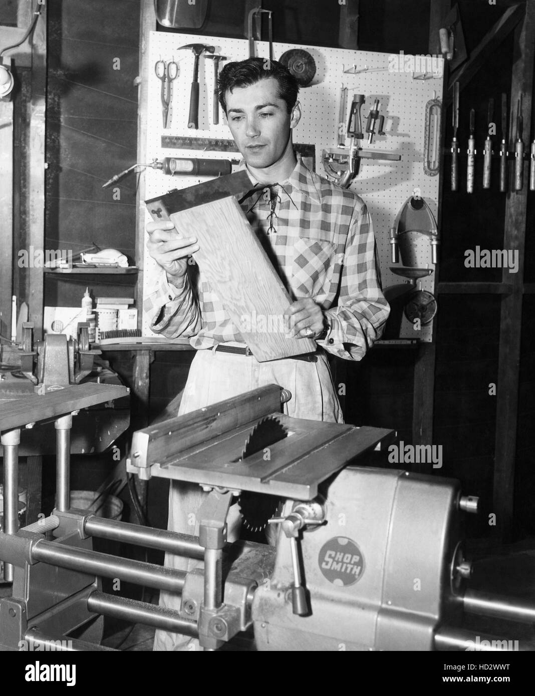 Rick Jason, at home in his workshop, 1957 Stock Photo - Alamy