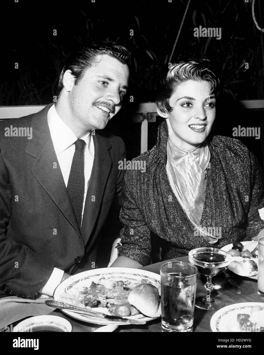 Richard Long, right, with his fiancee, actress Suzan Ball, at a 1953 ...