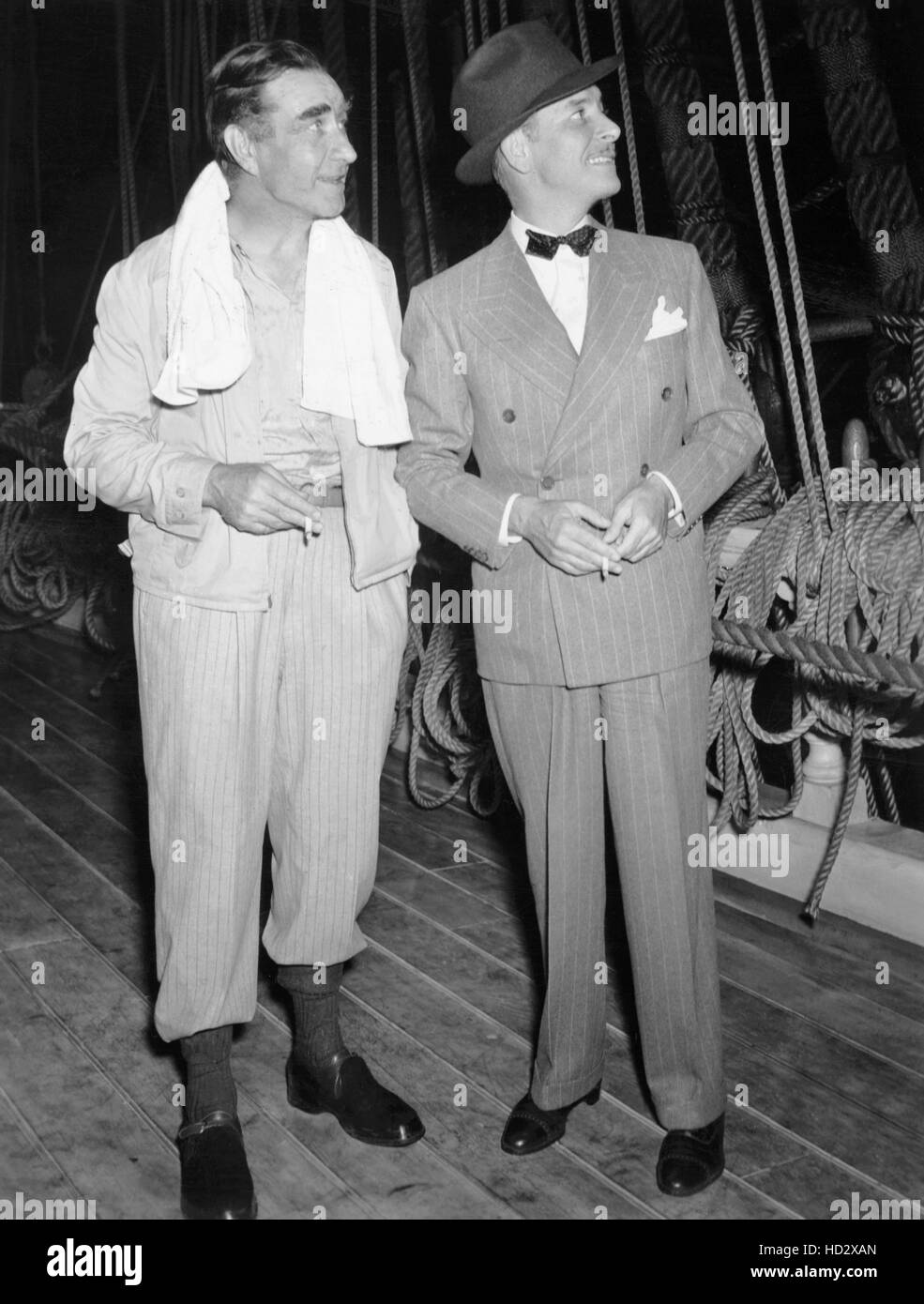 Ronald Colman, right, visits director Frank Lloyd, on the square-rigger ...