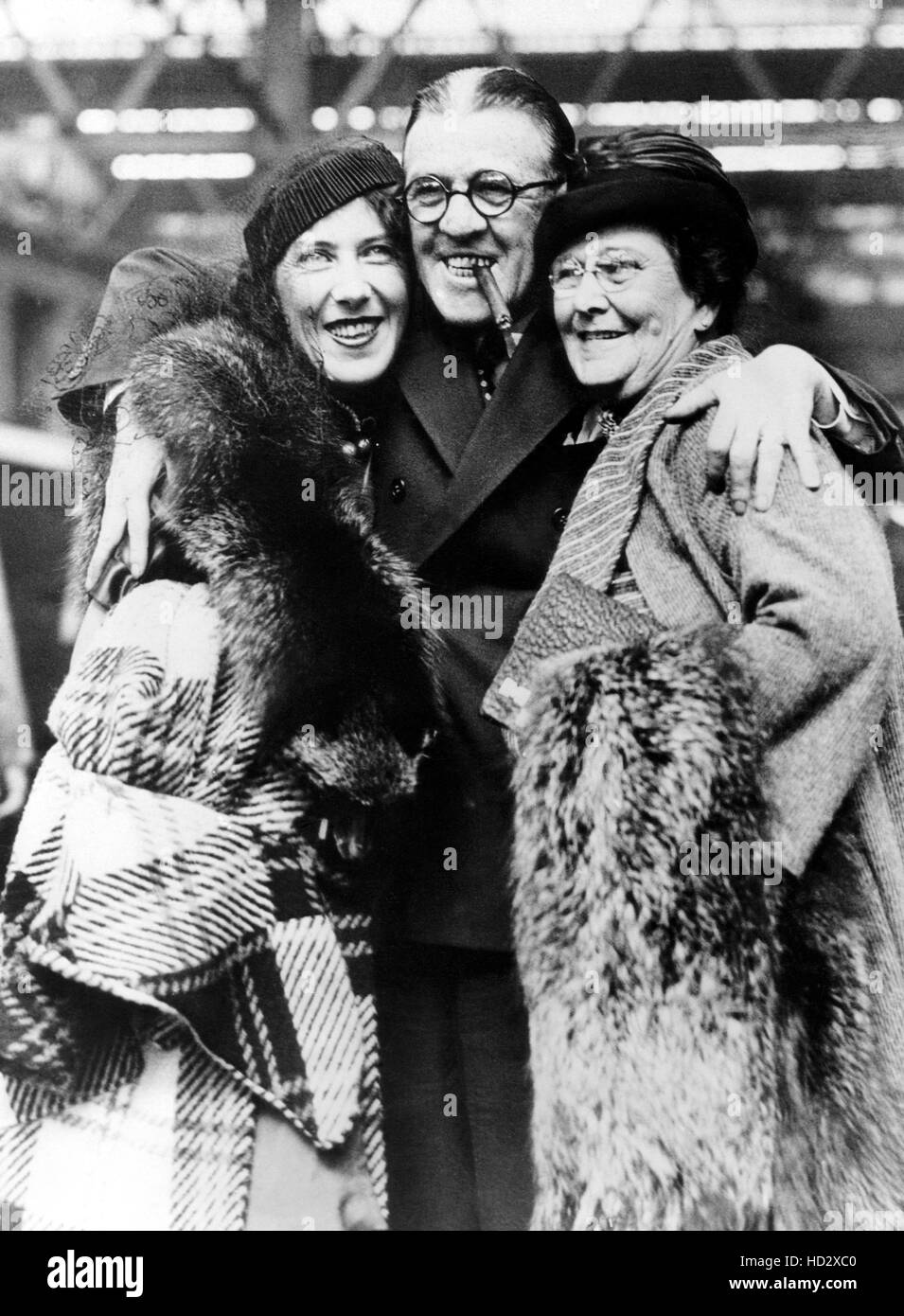 Robert Woolsey (center) posing with his wife, Mignone (left) and mother ...