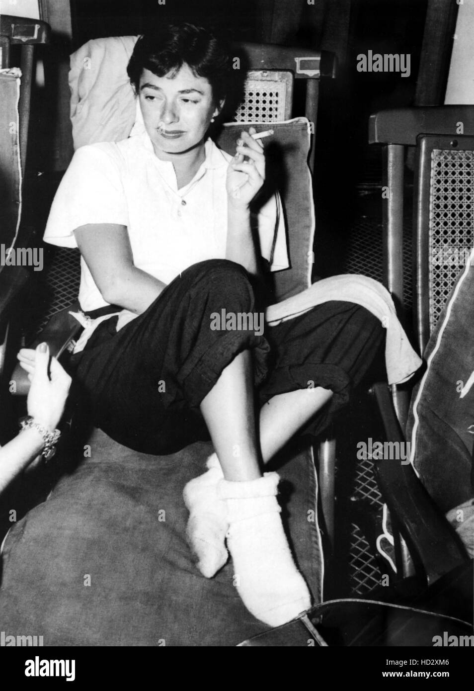 Ruth Roman, wearing donated clothing, as she recuperates on the Ile de ...