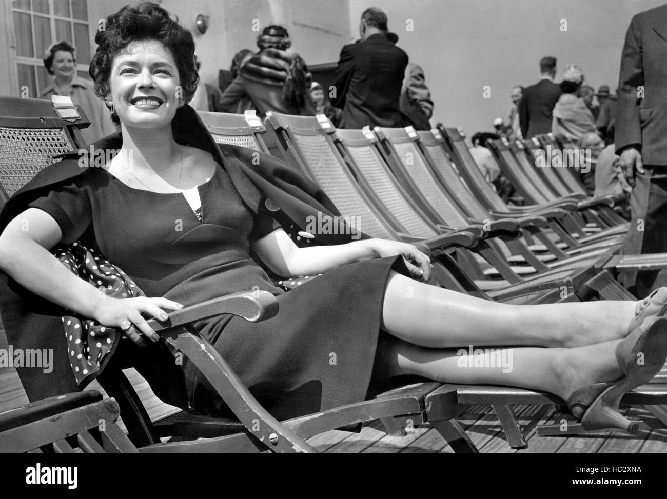 Ruth Roman relaxing aboard the Liberte before sailing for Europe to ...