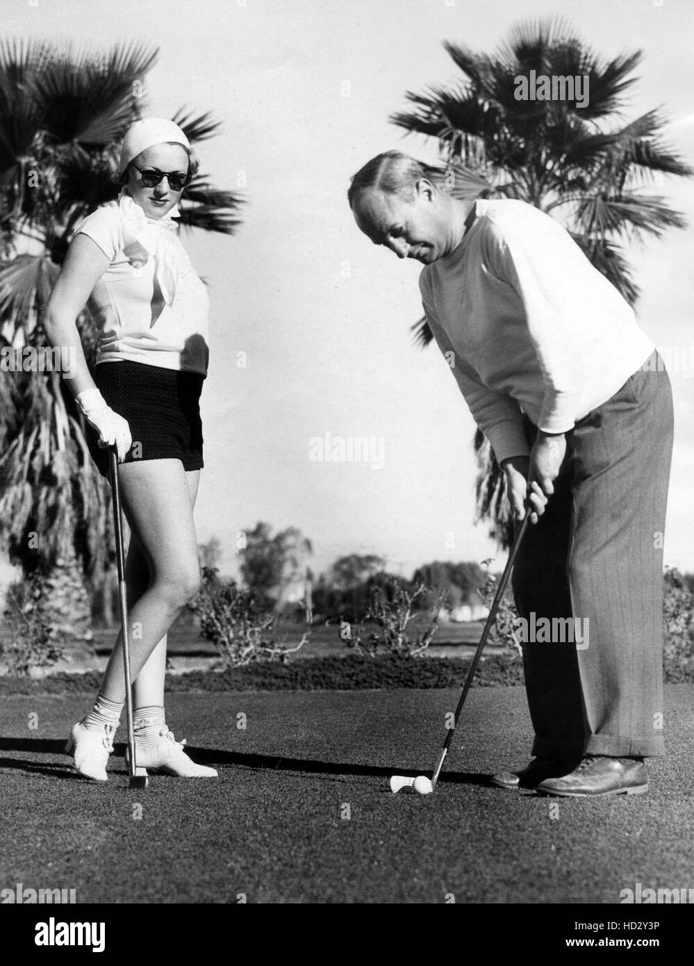 From left: Sally Eilers with husband, Harry Joe Brown, golfing at Palm ...