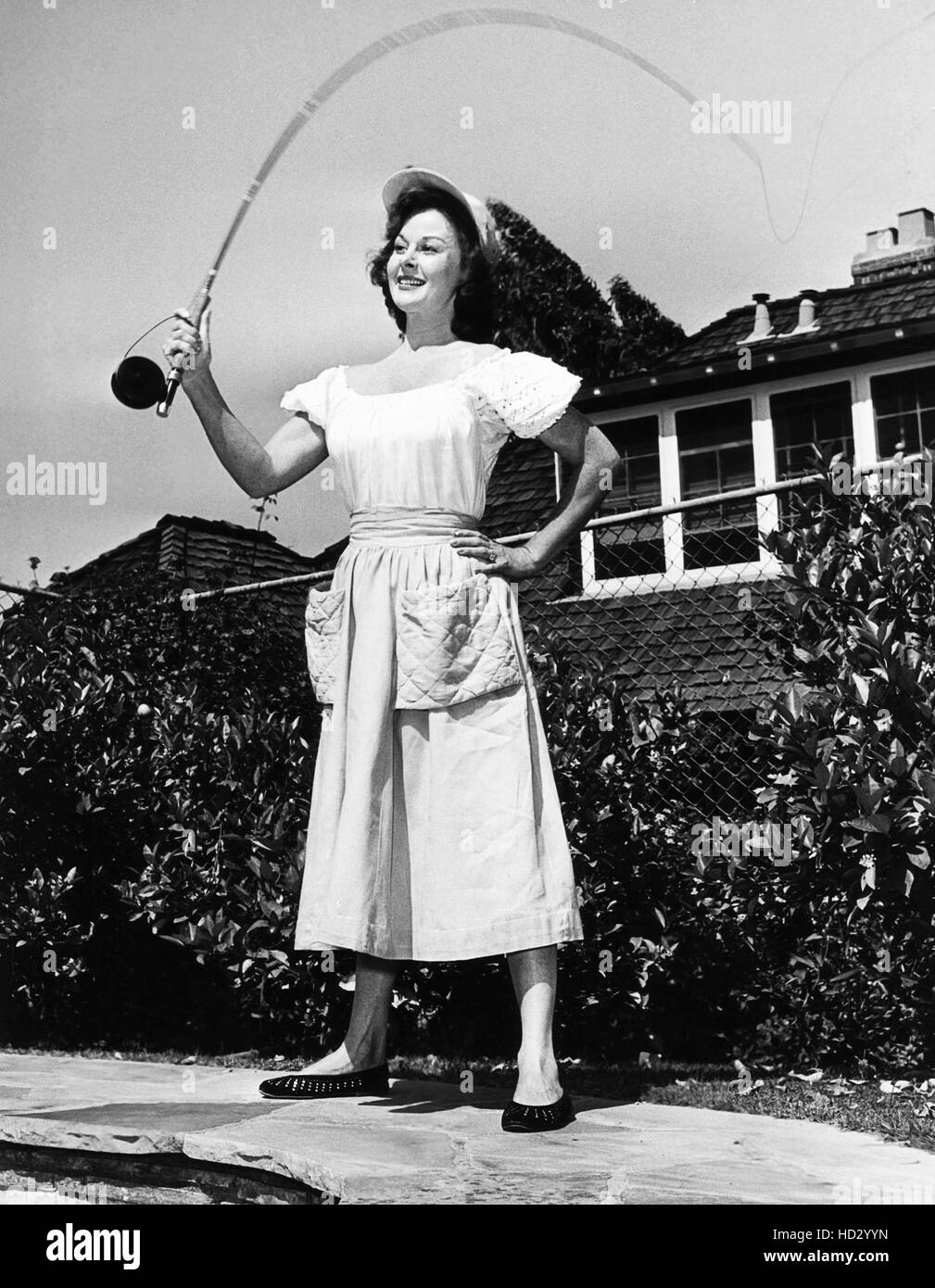 Susan Hayward, seeing what she can catch in her back-yard pool, ca ...