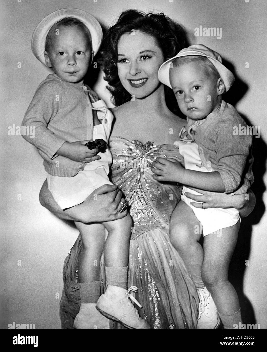 SUSAN HAYWARD beams with pride as she holds her 2 year old twin boys ...