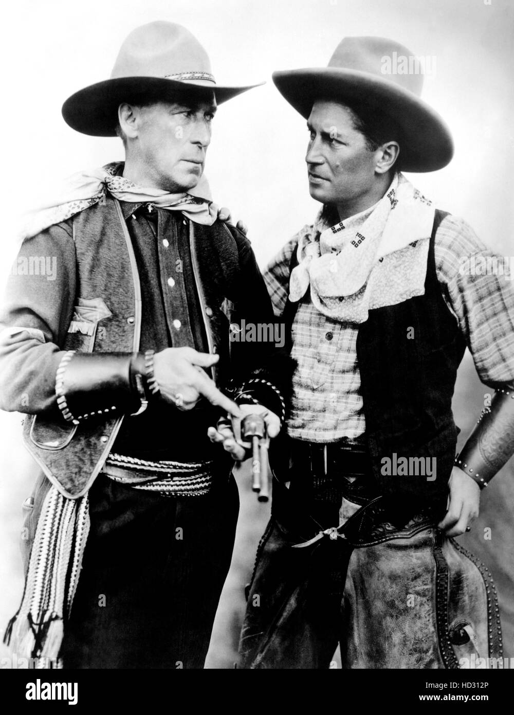 William S. Hart, left, introduces Hollywood newcomer Maurice Chevalier ...