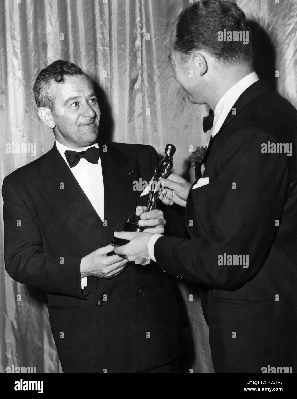 Director William Wyler receiving Academy Award for Best Director for ...