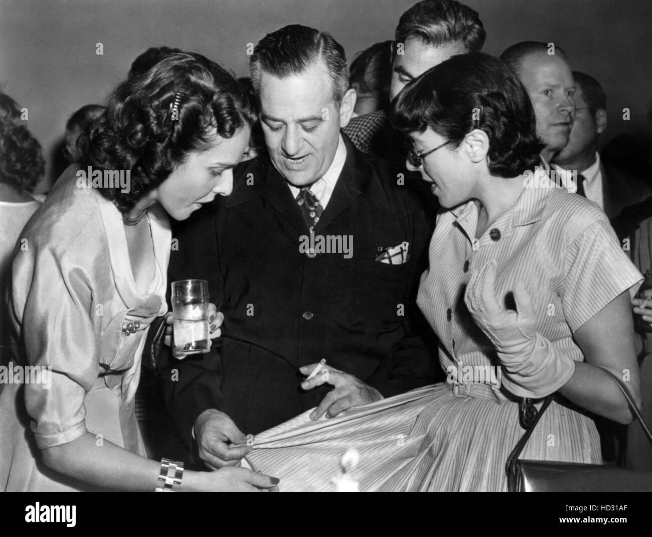 William Wyler (center) with l-r: Margaret Tallichet Wyler, Edith Head ...