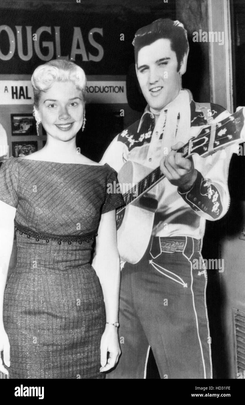Yvonne Lime, with a cut-out of her ex-boyfriend, Elvis Presley, July 1957 Stock Photo - Alamy