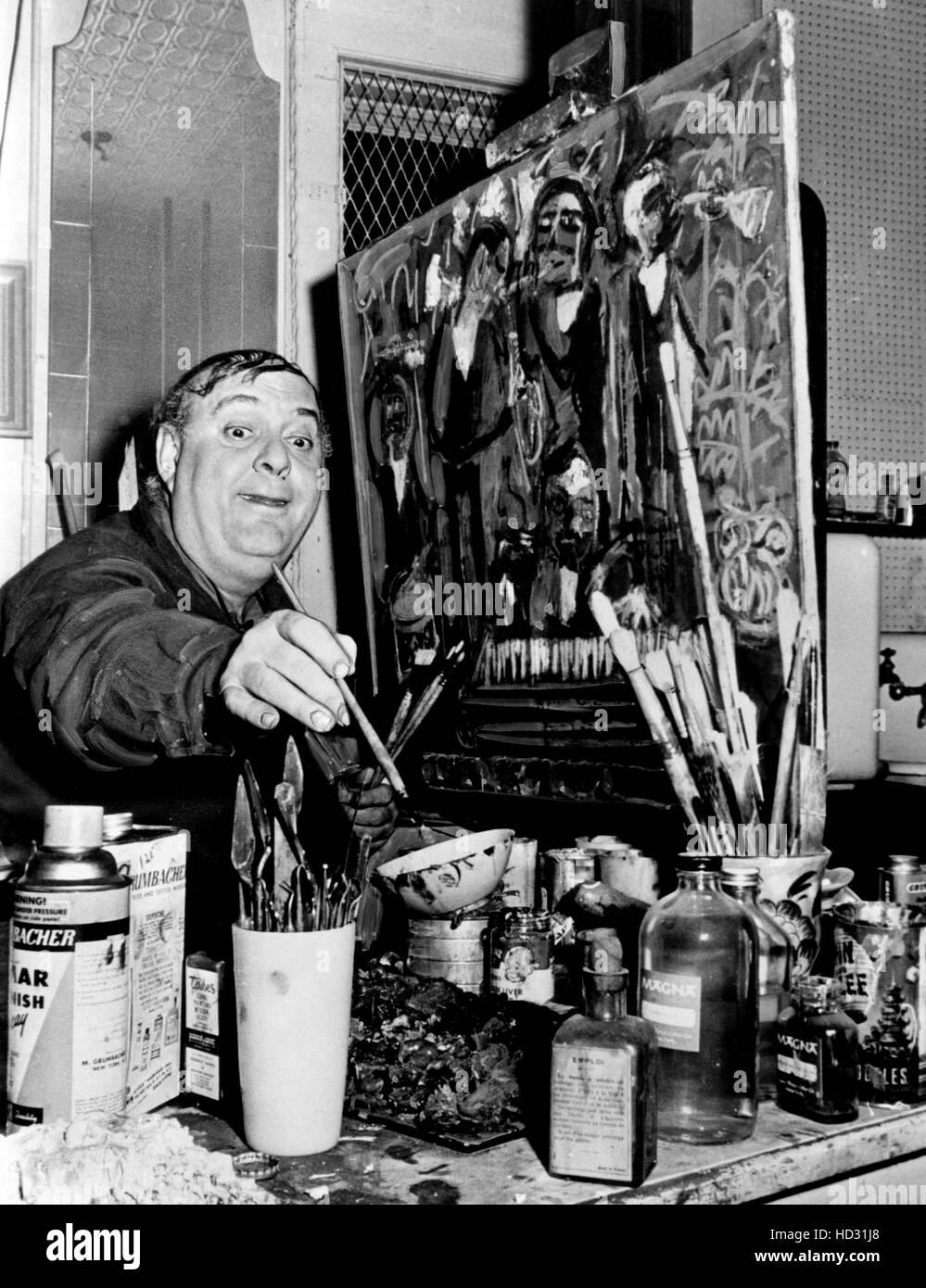 Zero Mostel painting at his studio, ca. early 1960s Stock Photo - Alamy