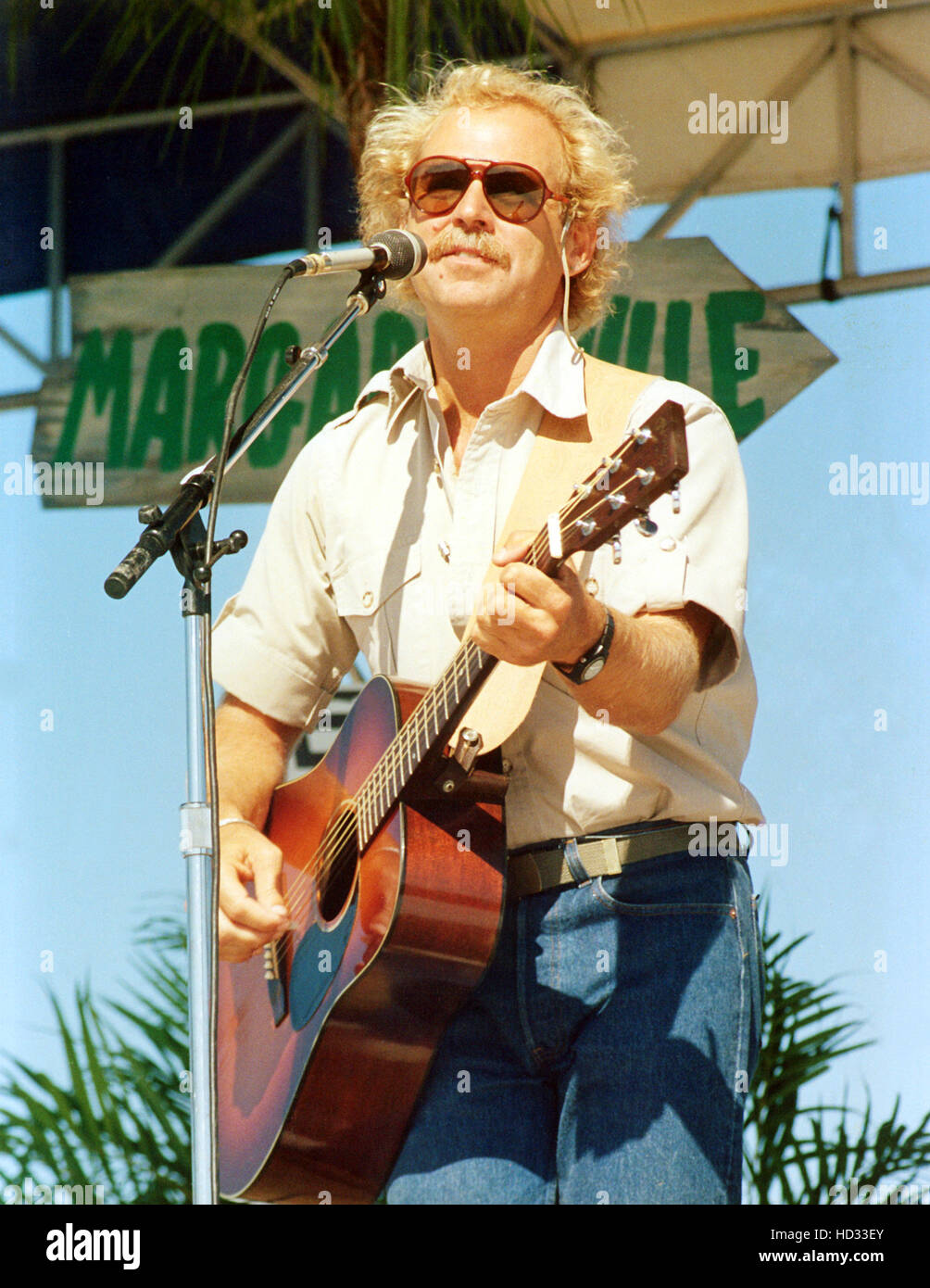 JIMMY BUFFETT, in a live outdoor performance, c. 1980s Stock Photo - Alamy