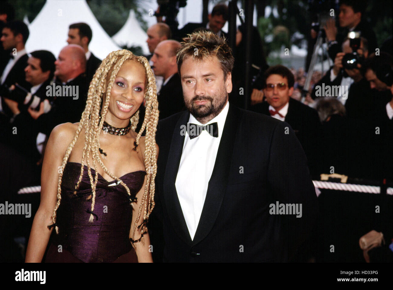 Luc Besson (and date) at Cannes Film Festival, 2000 by Thierry Carpico ...