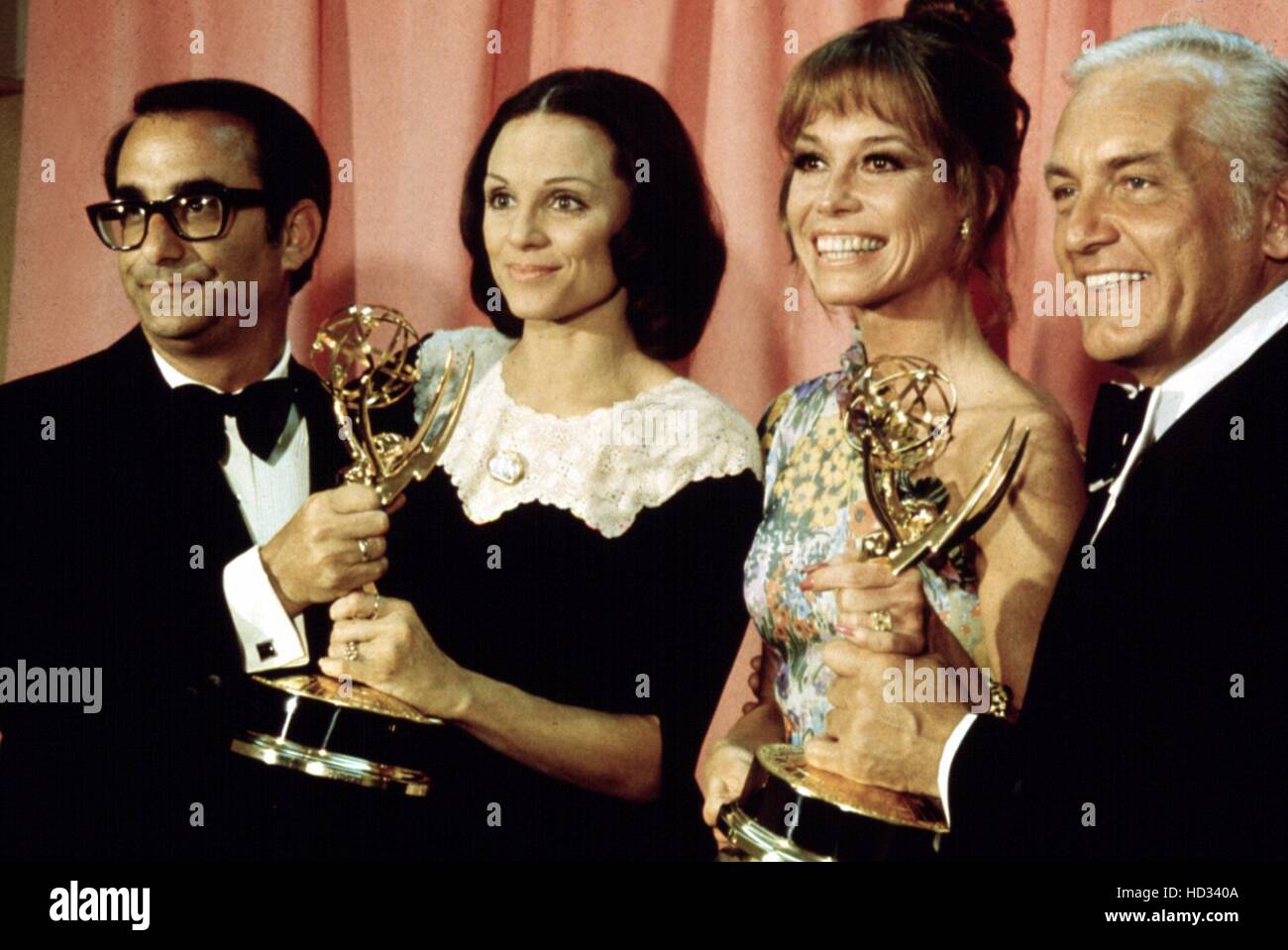 VALERIE HARPER, MARY TYLER MOORE and TED KNIGHT holding their MARY ...