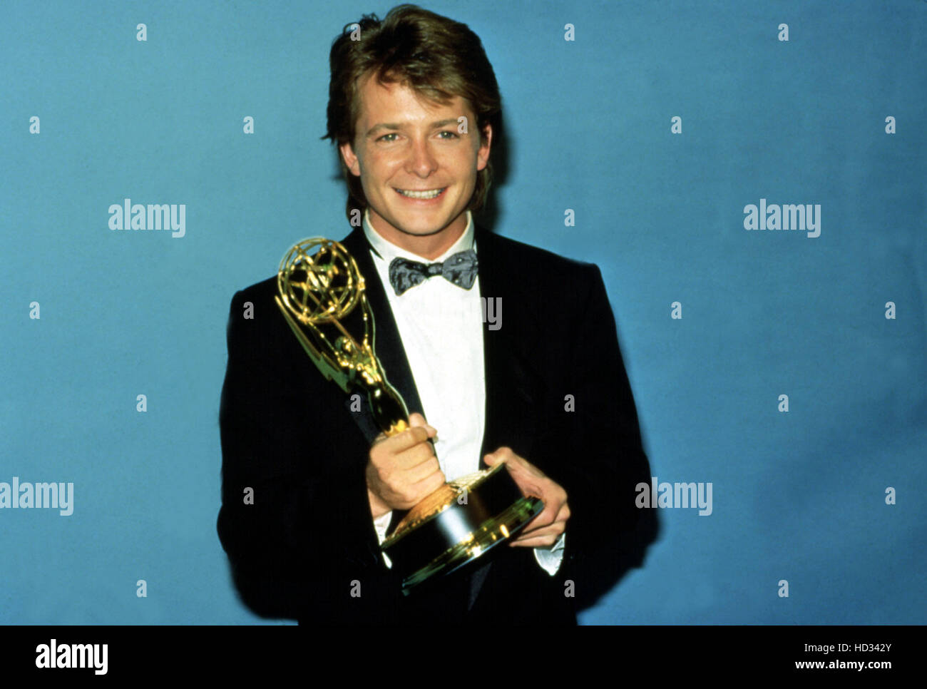 Michael J. Fox with his Emmy Award, 1987 Stock Photo - Alamy