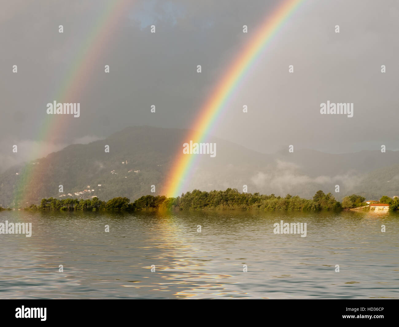 Double rainbow and flood Stock Photo - Alamy