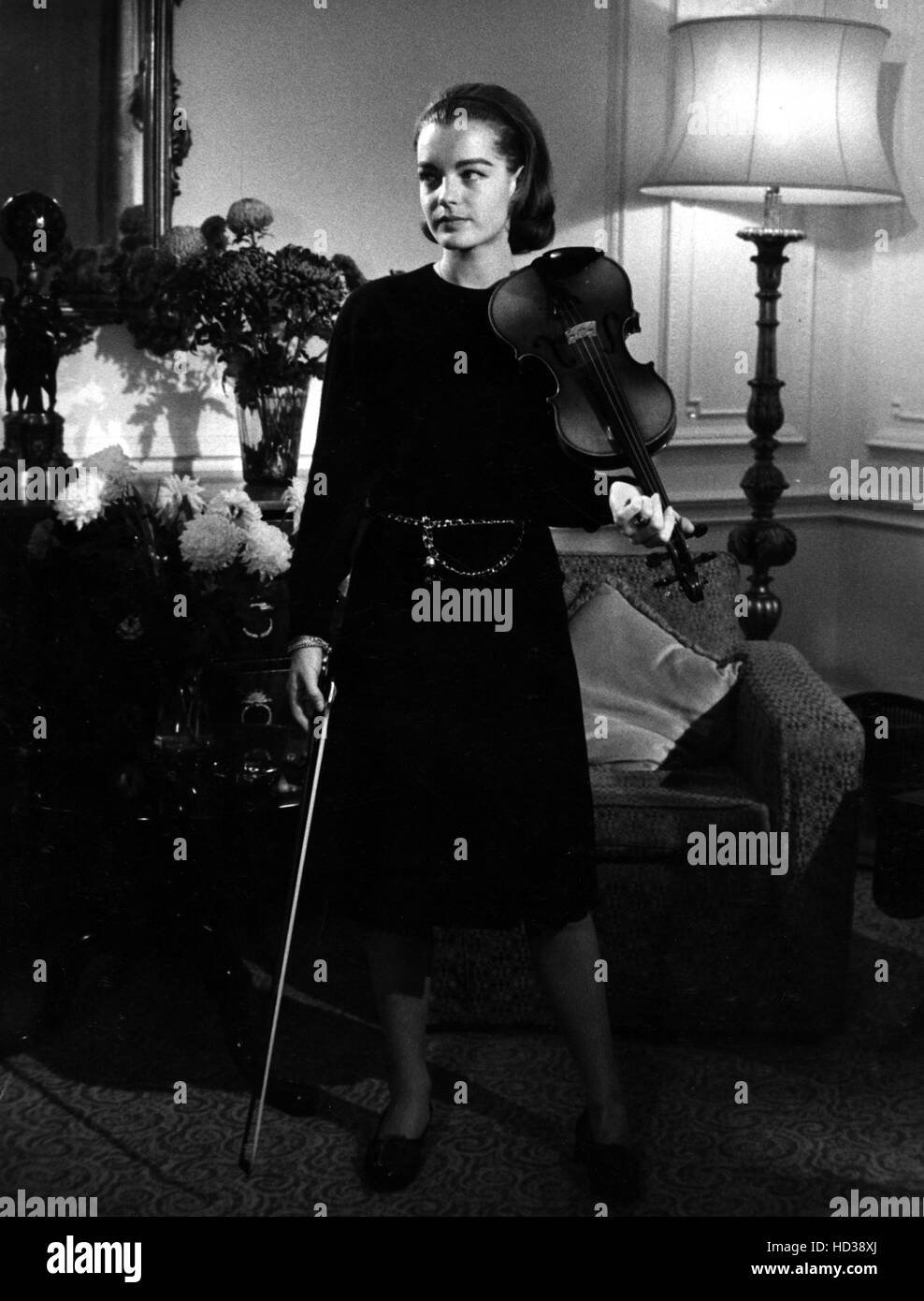 Romy Schneider, wearing Chanel, in her London hotel room practicing ...