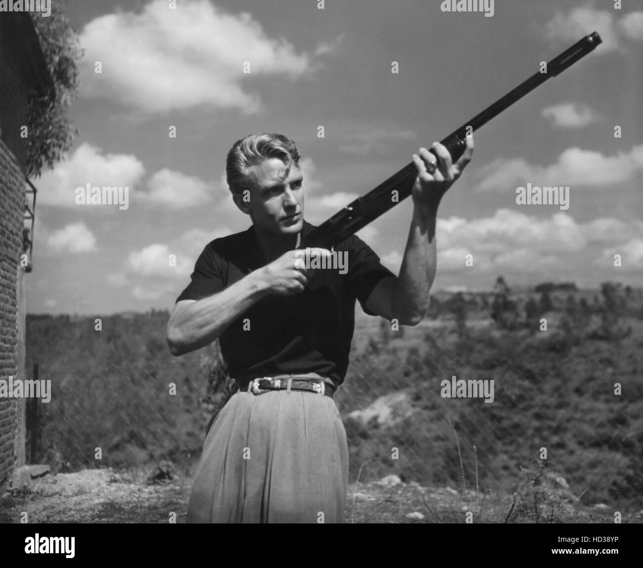 Robert Stack with skeet shooting rifle, 1940s Stock Photo - Alamy