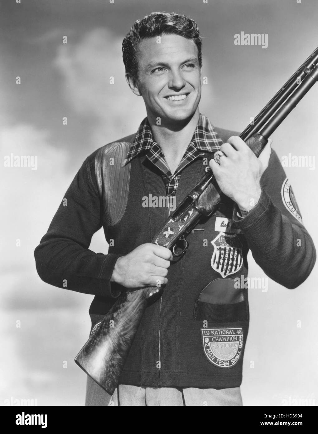 Robert Stack with skeet shooting championship patch on his jacket, 1948 ...