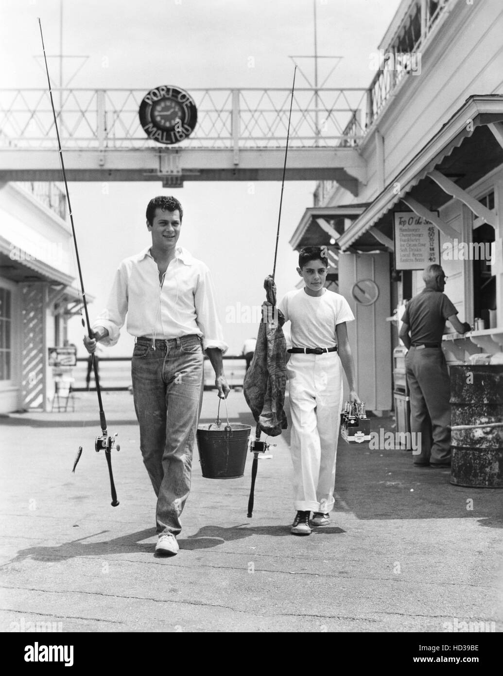 Tony Curtis (left) fishing at Malibu Pier with his brother Robert ...