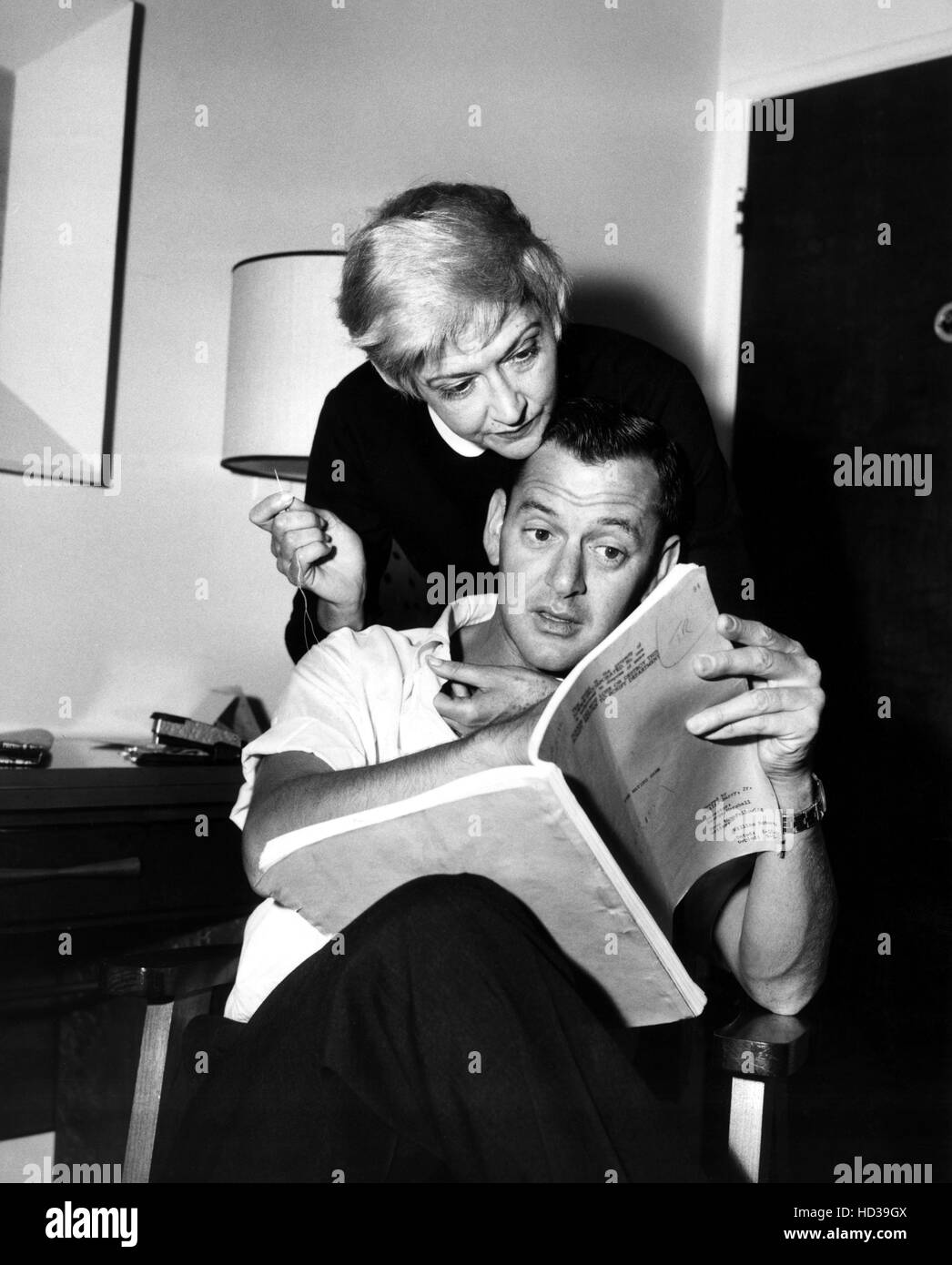 Tony Randall reading THE MATING GAME script while his wife, Florence ...